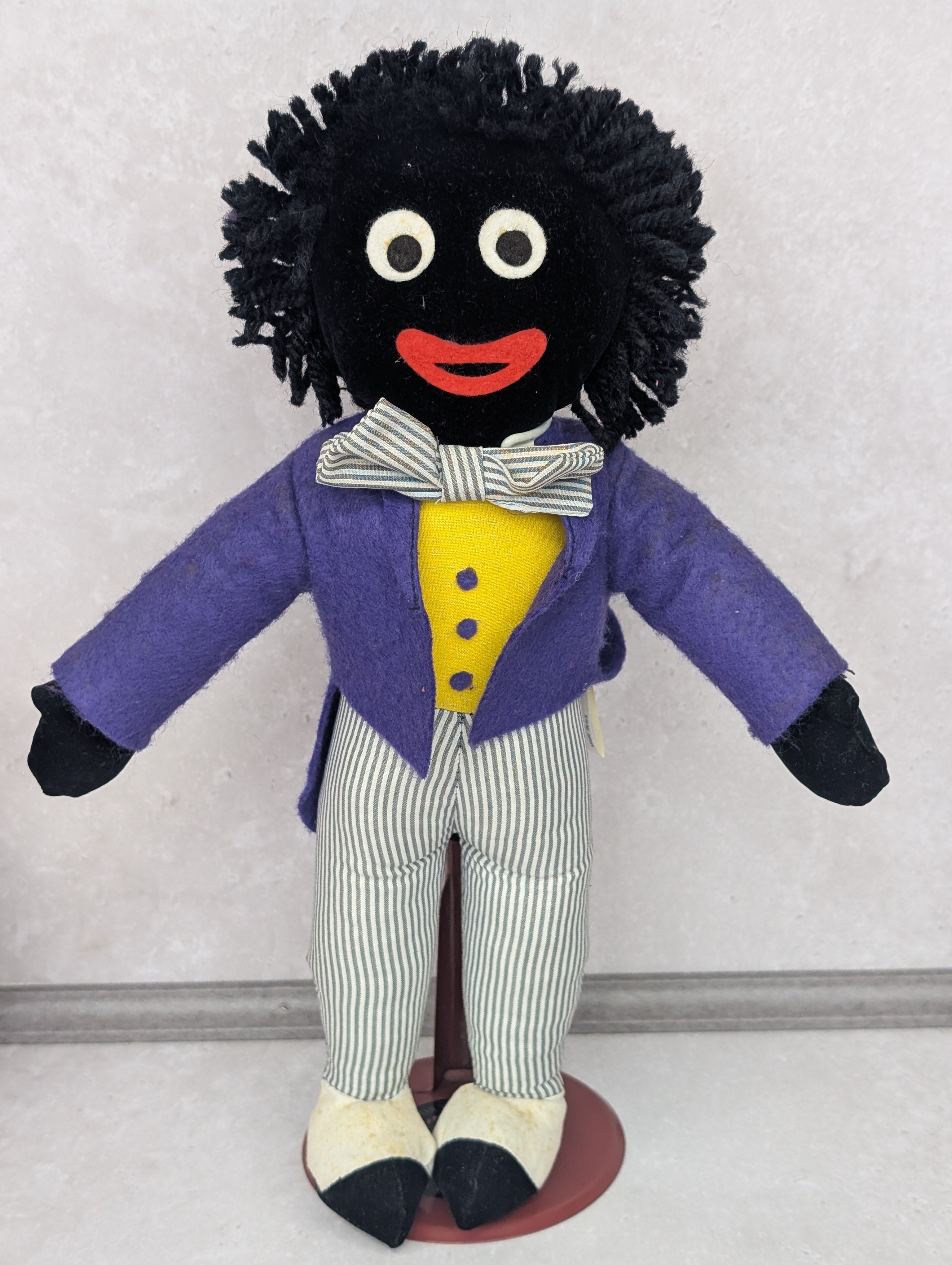 Golly with Purple Jacket by Deans – GollyBadges.com