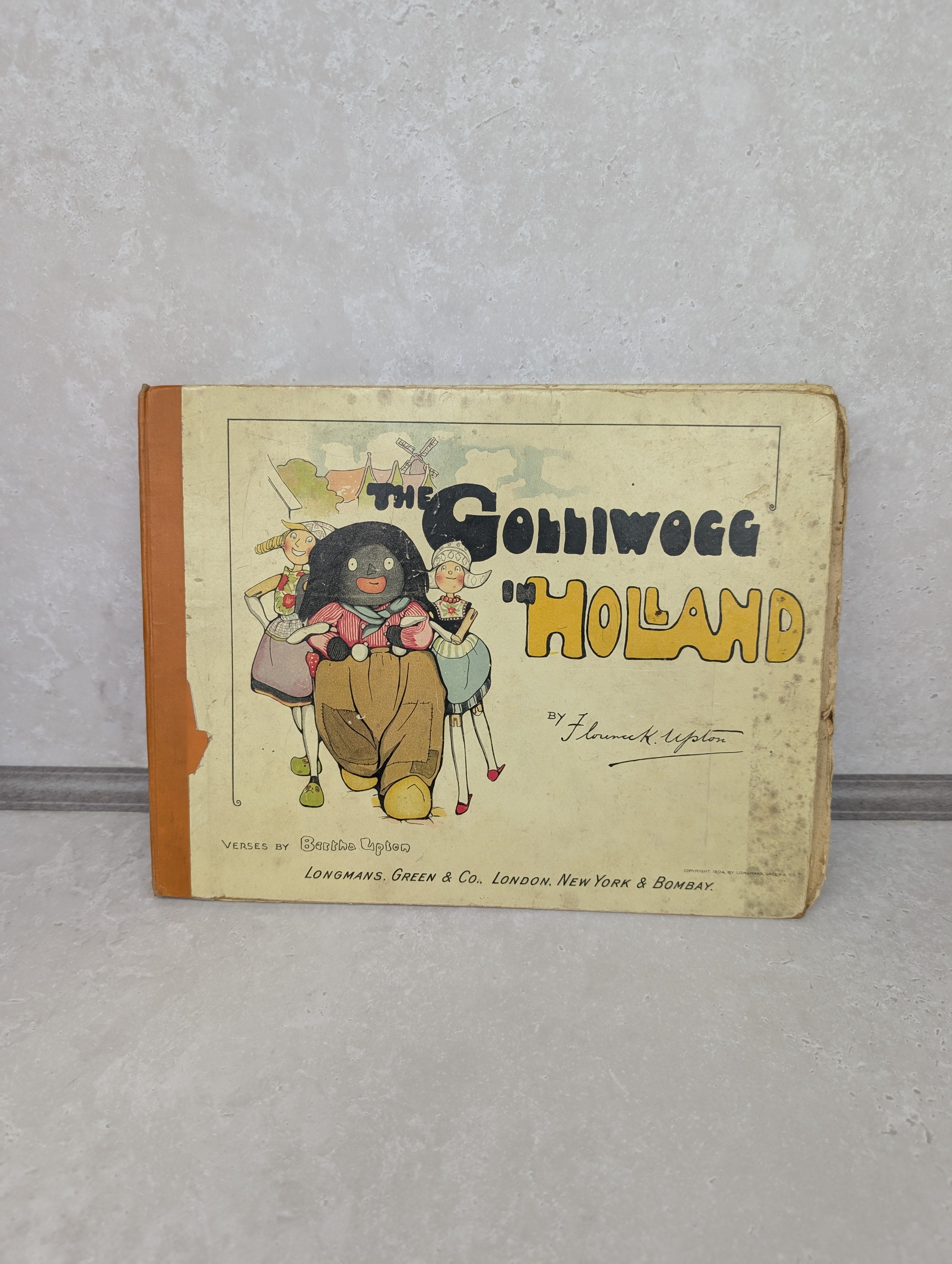 Original The Golliwogg in Holland by Florence Upton – GollyBadges.com