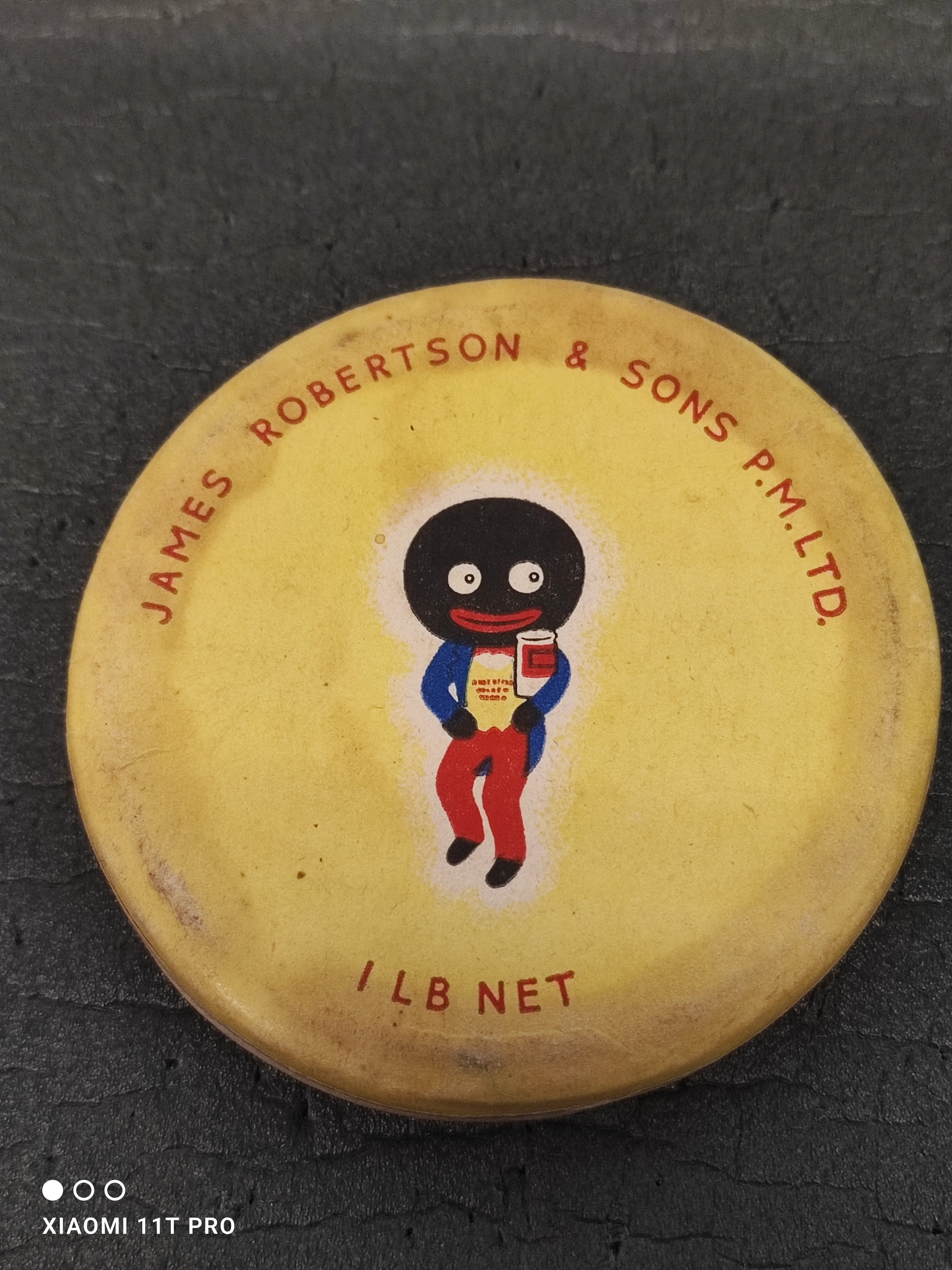 Yellow Paper Jar Lid Golliberry Advert – GollyBadges.com